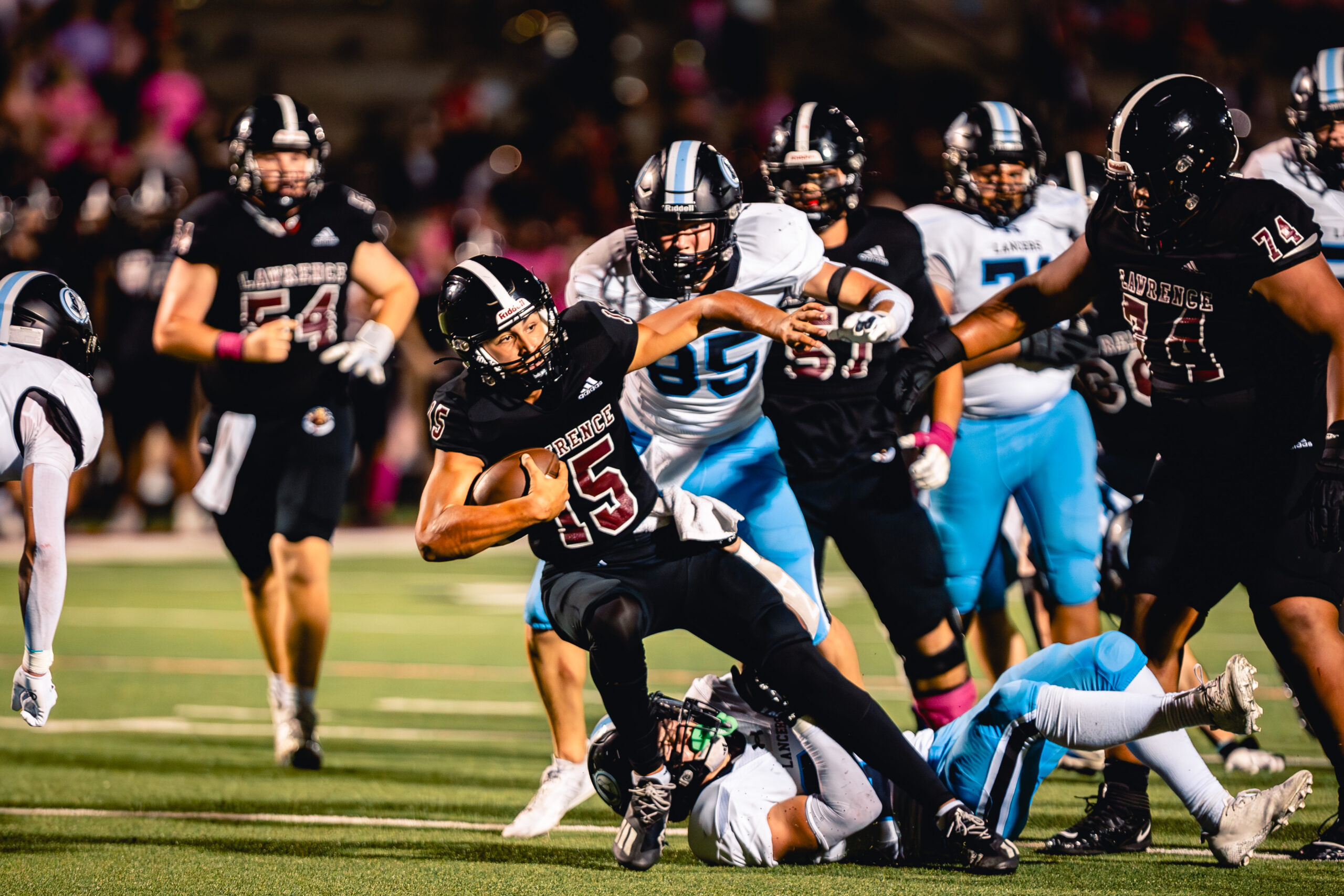 Lawrence struggles to stop the run in 28-20 loss to Shawnee Mission ...